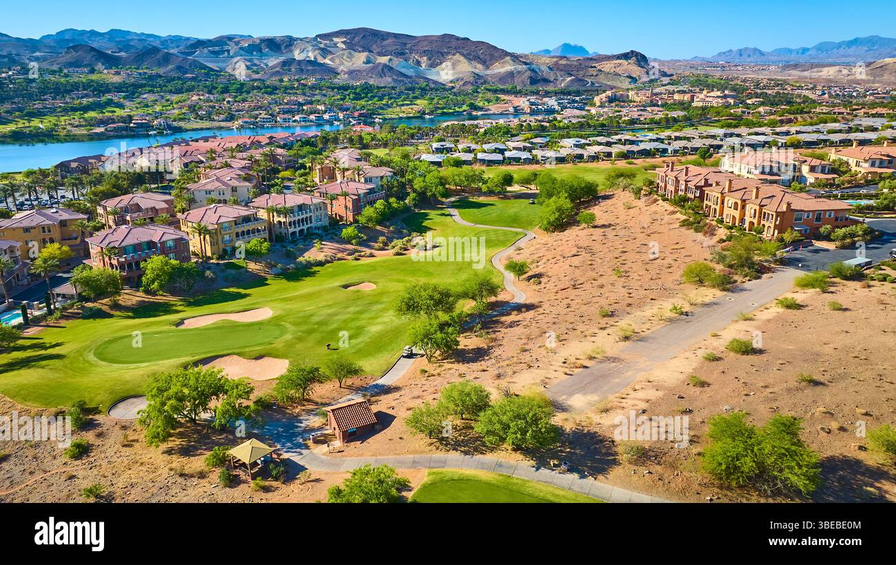 Aerial Golf Course Lakefront Homes and Desert Mountains Fly Over Stock ...