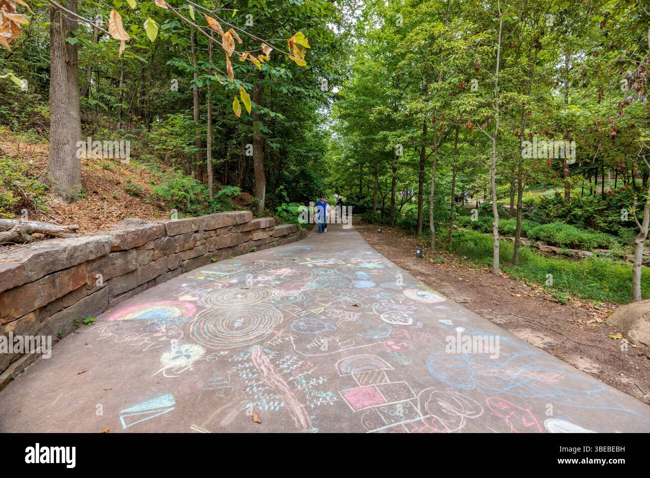 Chalk artwork on the sidewalk in the Crystal Bridges Museum of American ...