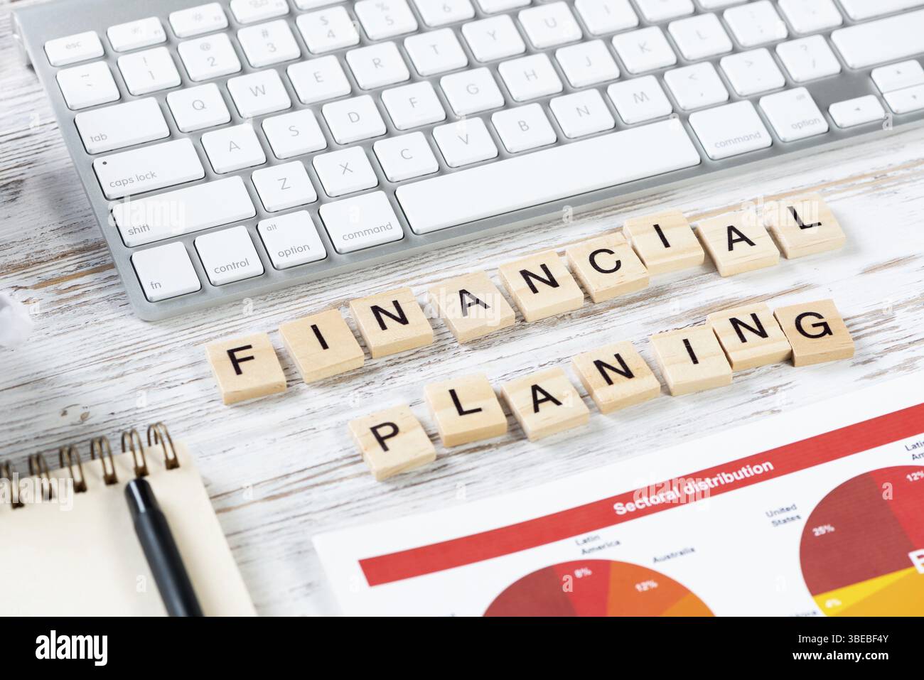 Financial planning concept with letters on cubes. Still life of office ...