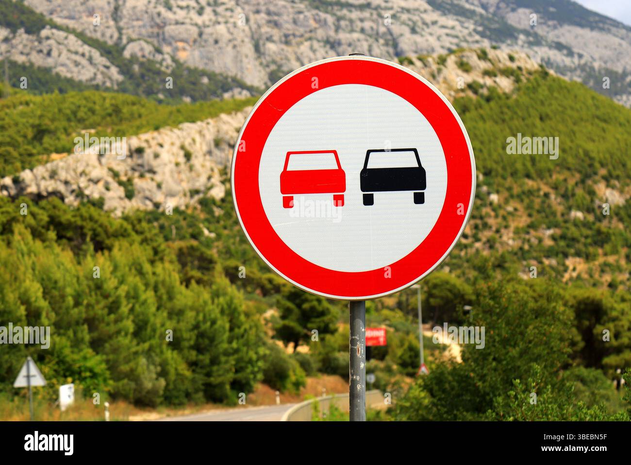Sign - overtaking is prohibited, on beautiful mountain road in Croatia ...