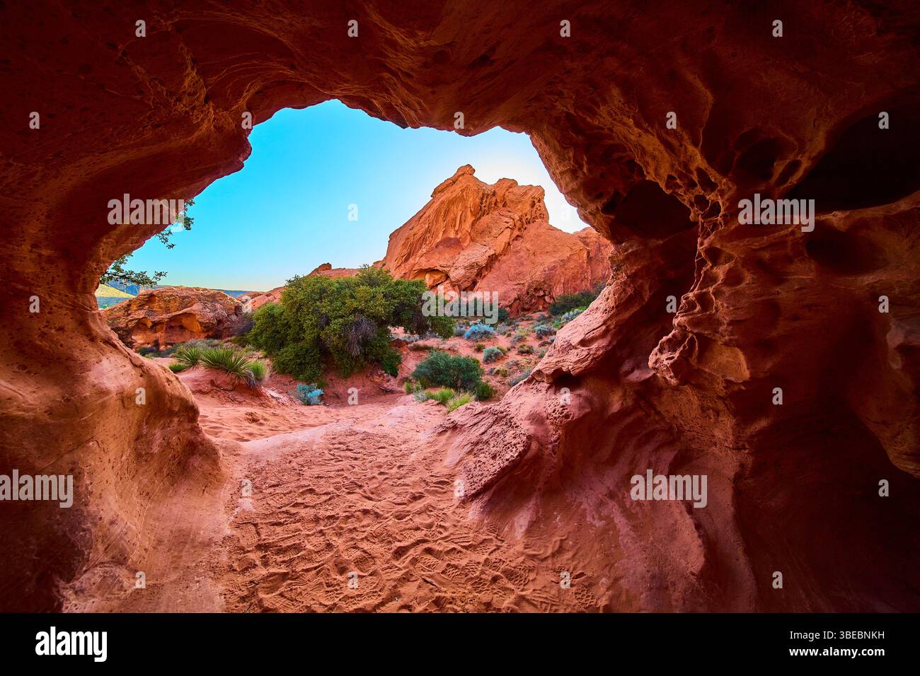 Sandstone Cave Textures and Desert Vegetation Framing Babylon Arch ...