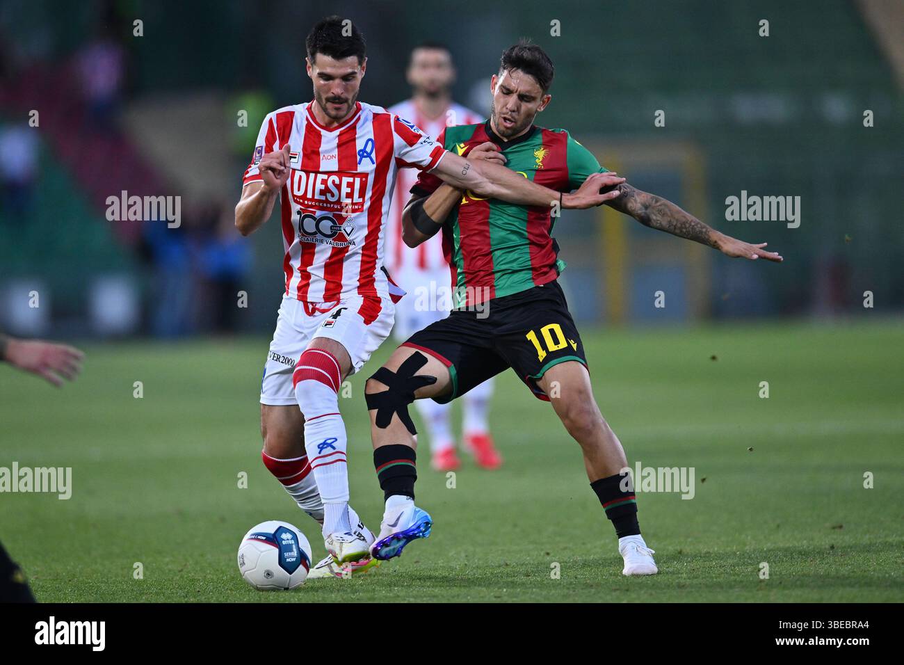 Marco Carraro of L.R. Vicenza and Emanuele Cicerelli of Ternana Calcio ...