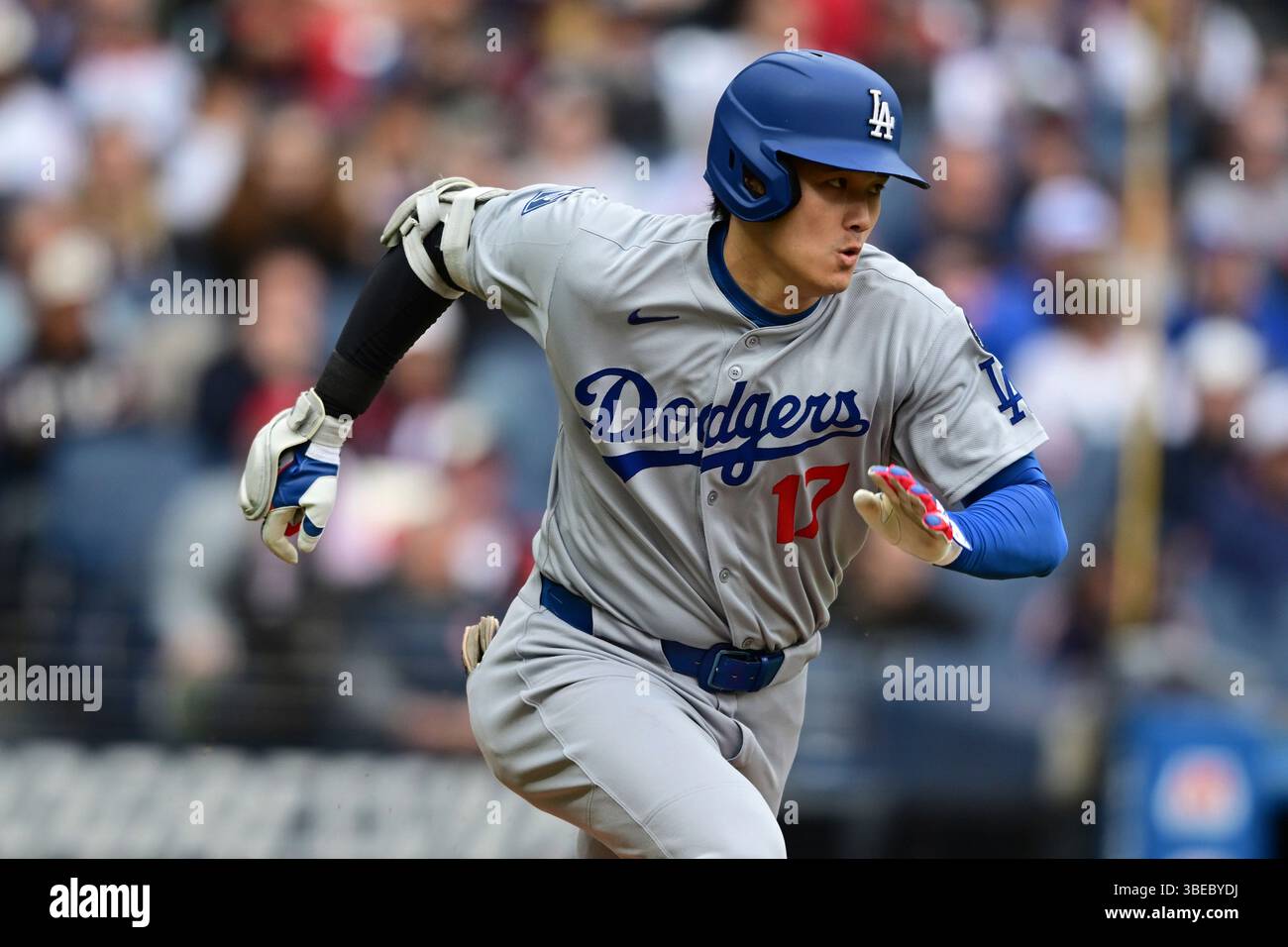 Los Angeles Dodgers' Shohei Ohtani runs after grounding out during the ...