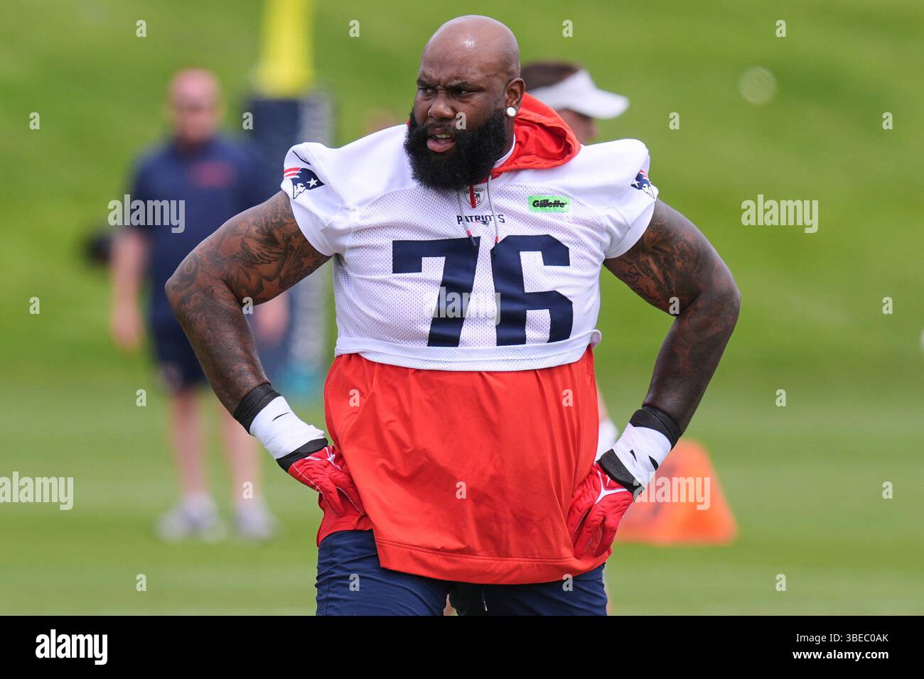 New England Patriots offensive tackle Morgan Moses (76) stretches ...