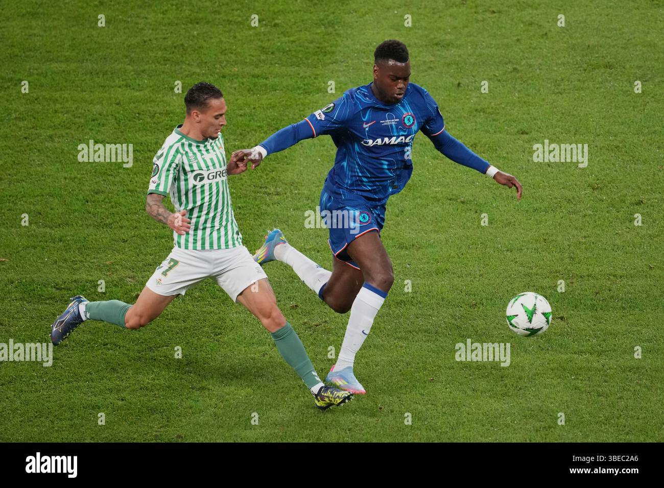 Chelsea's Benoit Badiashile, right, challenges for the ball with Betis ...
