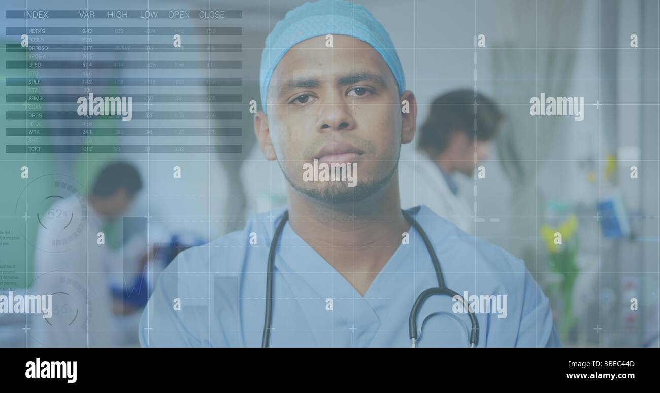 Standing doctor in blue scrubs and cap holding stethoscope in ward ...