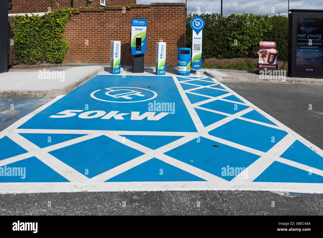 MFG, EV Power charging point at a garage forecourt, UK Stock Photo - Alamy