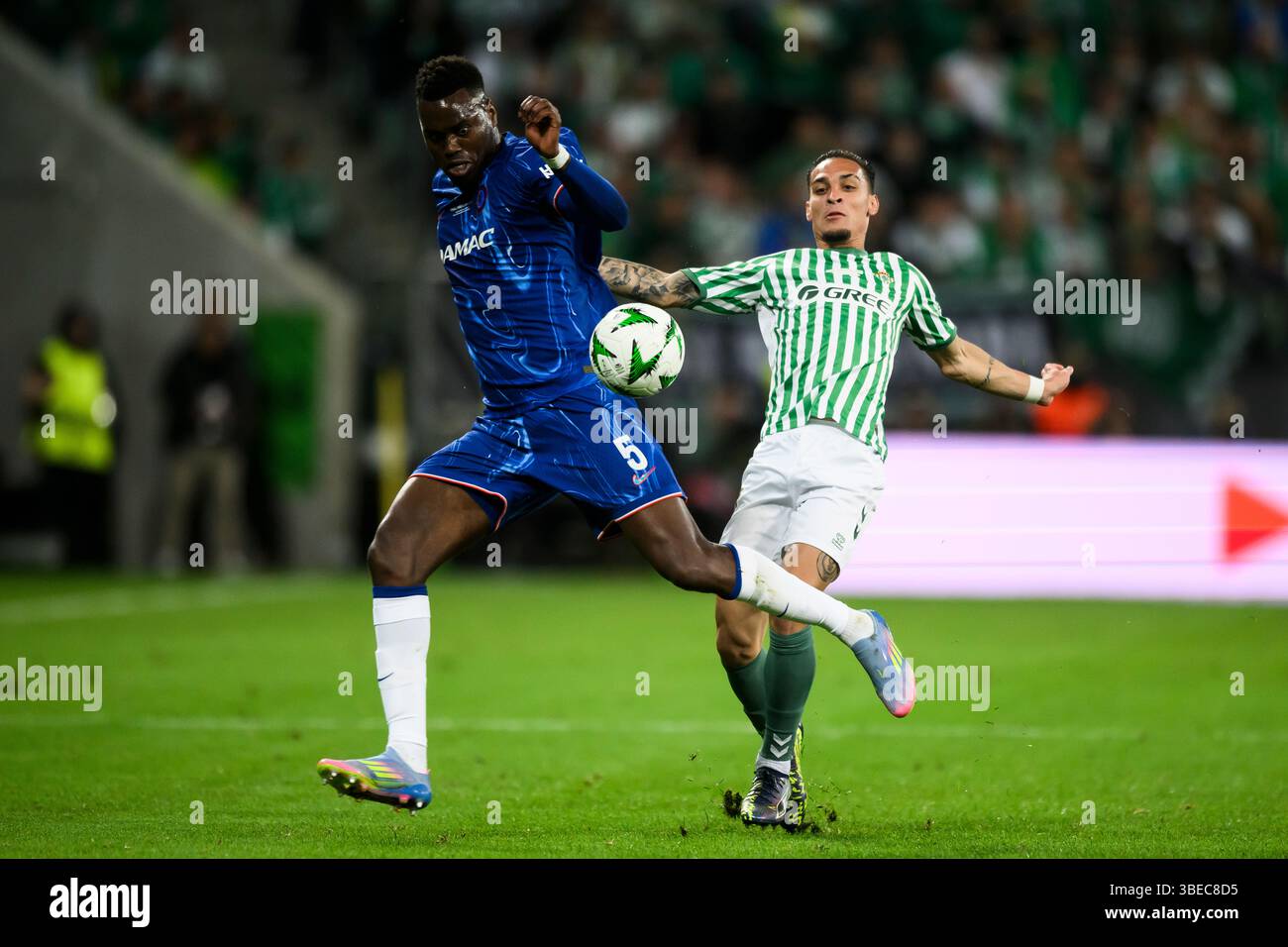 Benoit Badiashile of Chelsea FC competes for the ball with Antony of ...