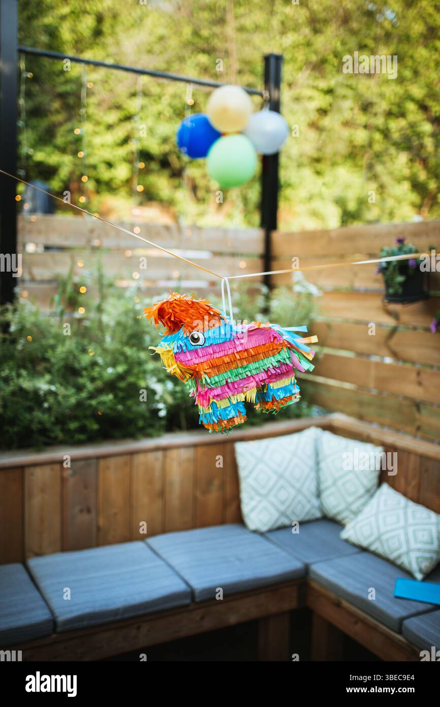 Colorful animal piñata hanging hi-res stock photography and images - Alamy