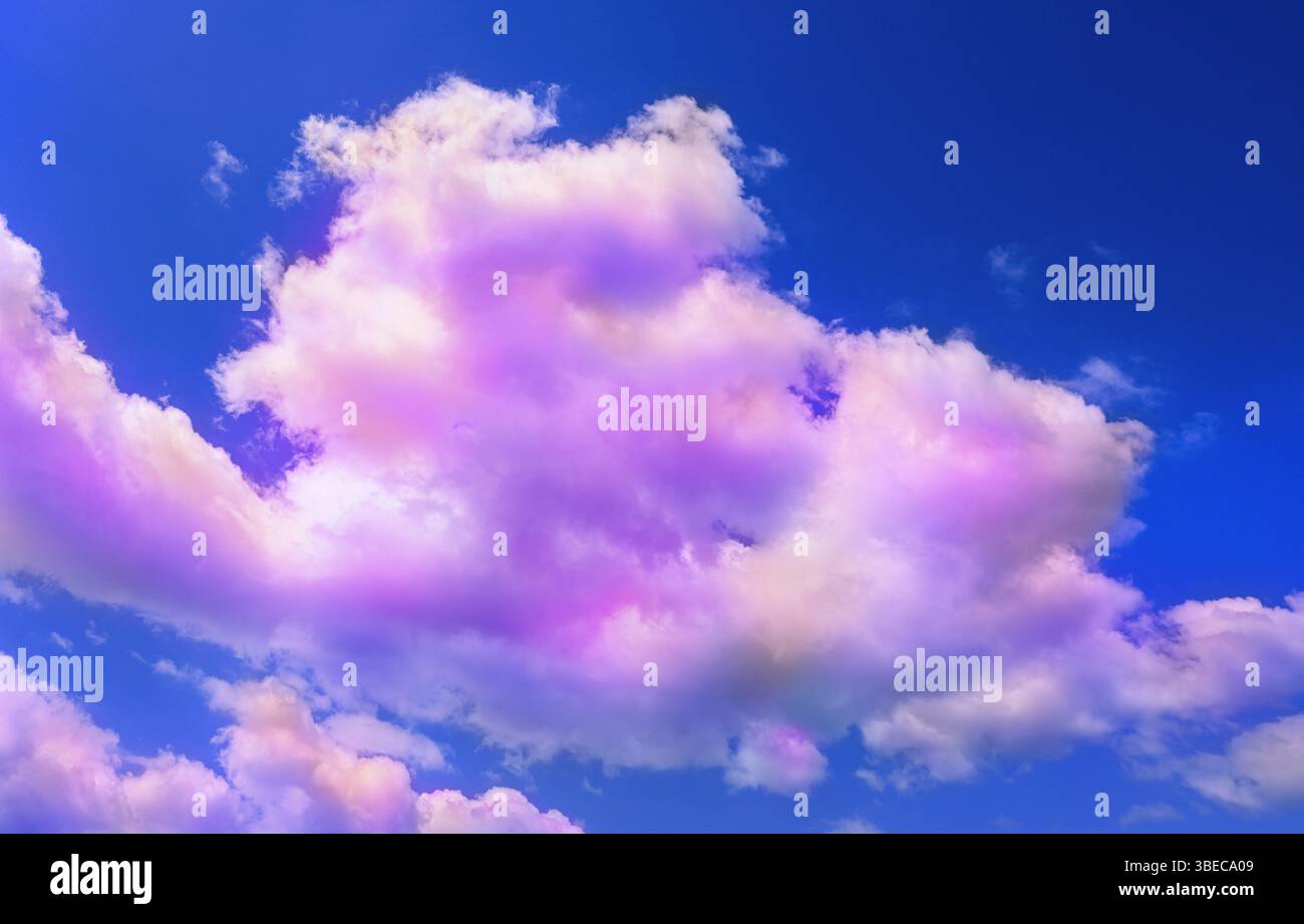 Fluffy color clouds floating in beautiful blue sky Stock Photo - Alamy