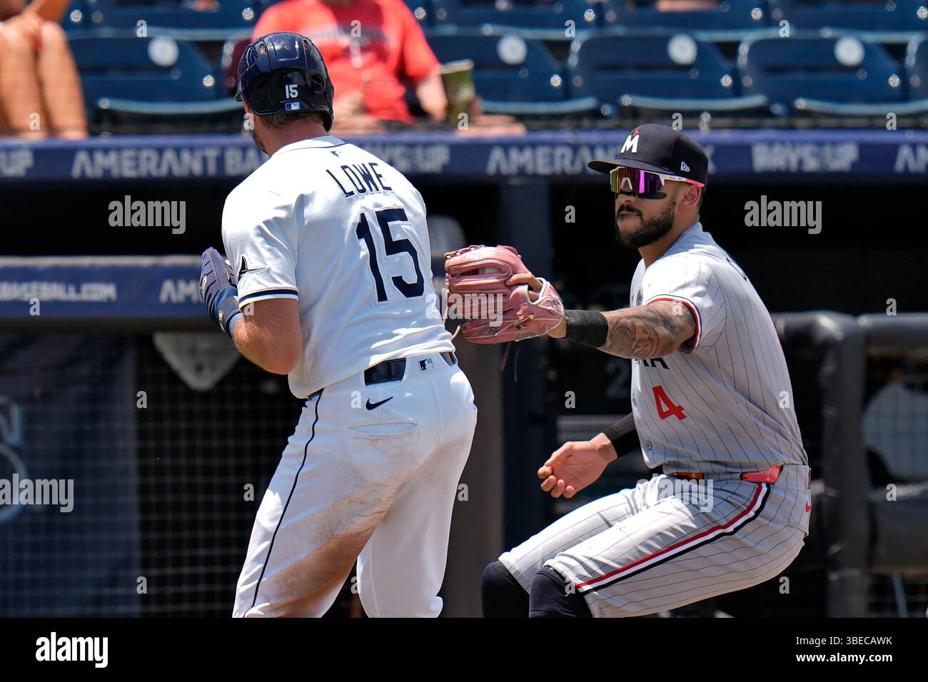 Minnesota Twins shortstop Carlos Correa (4) tags out Tampa Bay Rays ...
