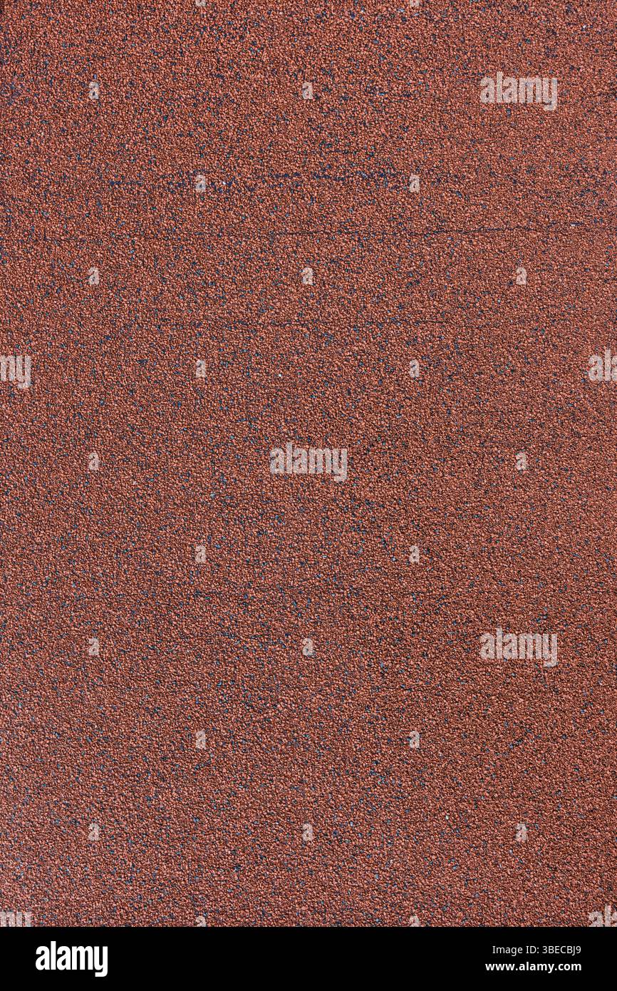 Background - roll tiles covered with red stone chips Stock Photo - Alamy