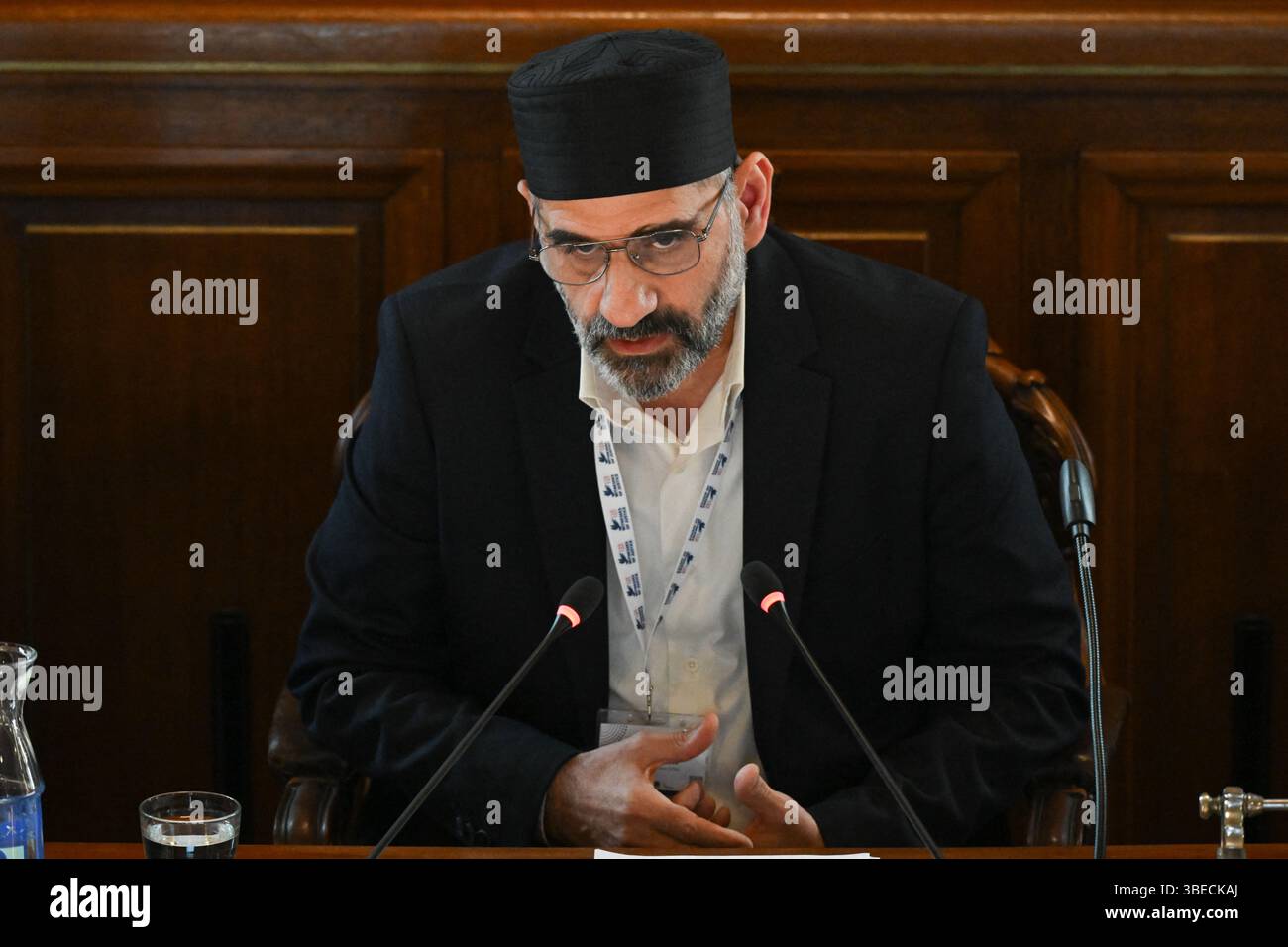 Executive Director at CF4J Usama Uthman attends the public conference ...