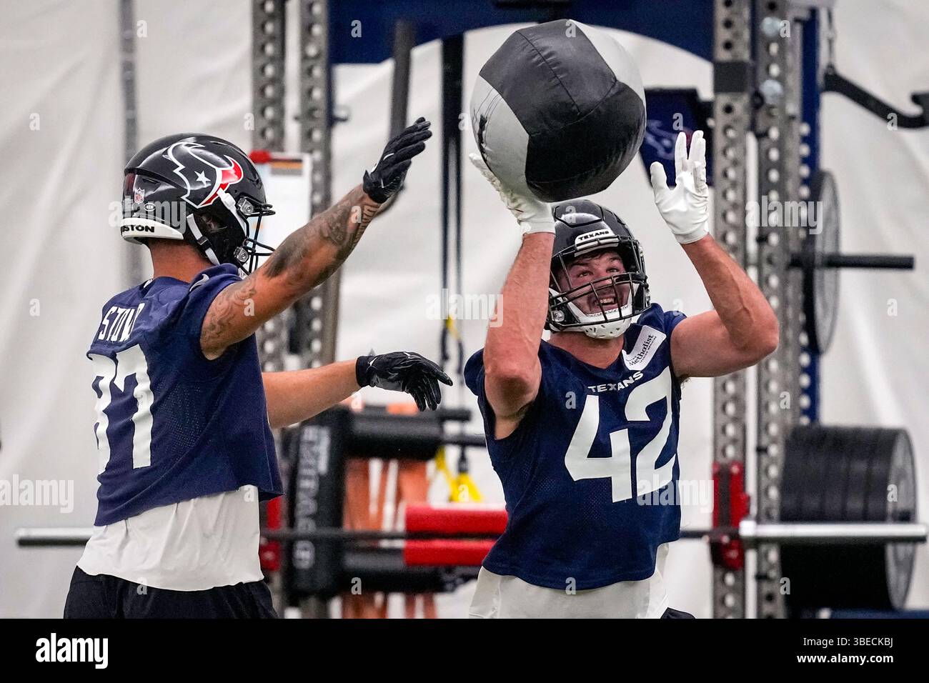 Houston Texans tight ends Cade Stover (87) and Luke Lachey (42) run a ...
