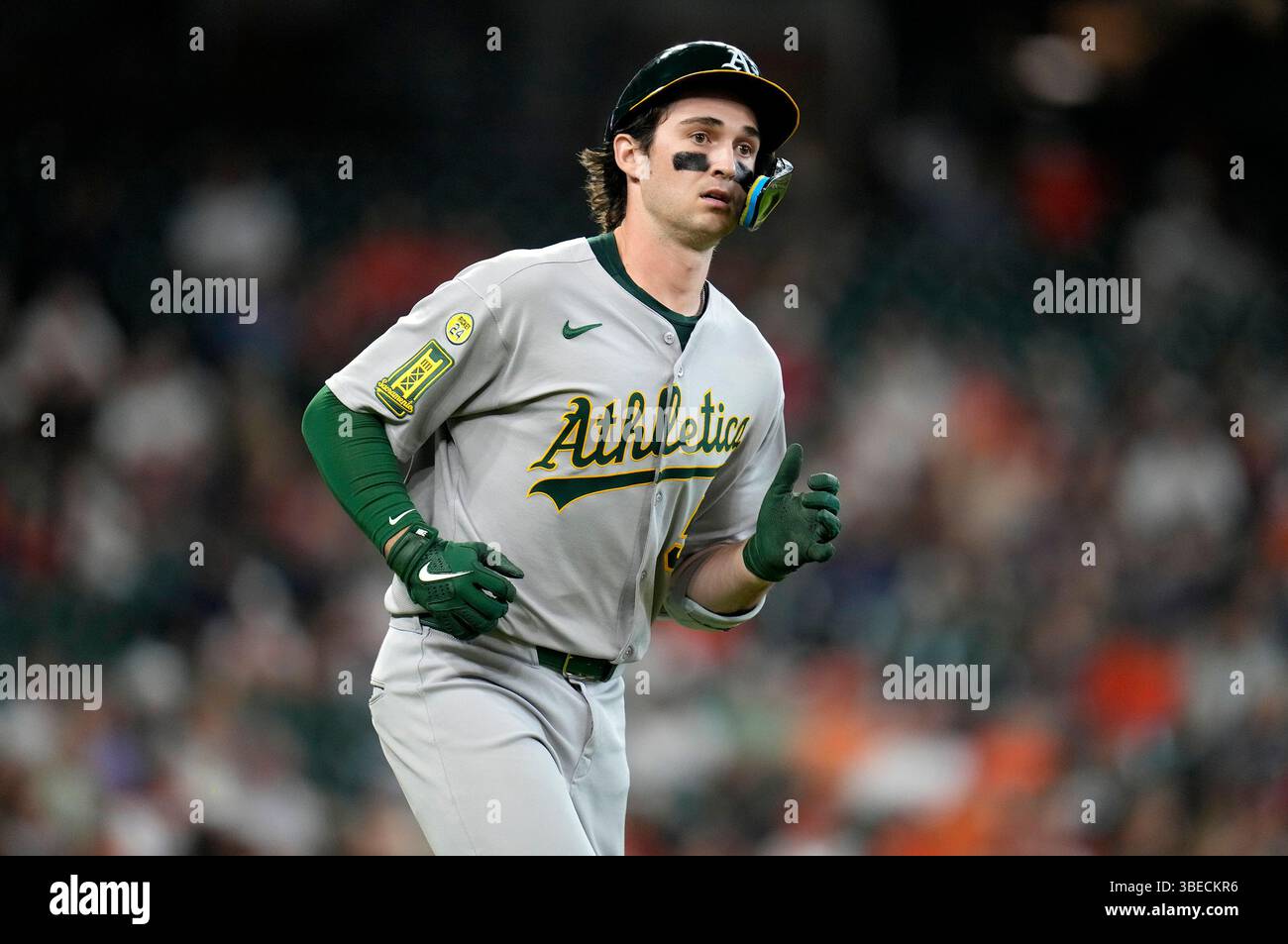 Athletics' Jacob Wilson reacts while running the bases after his home ...