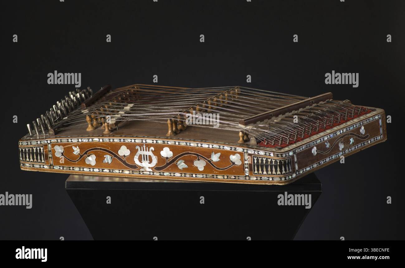 Ancient Asian stringed musical instrument on black background with ...