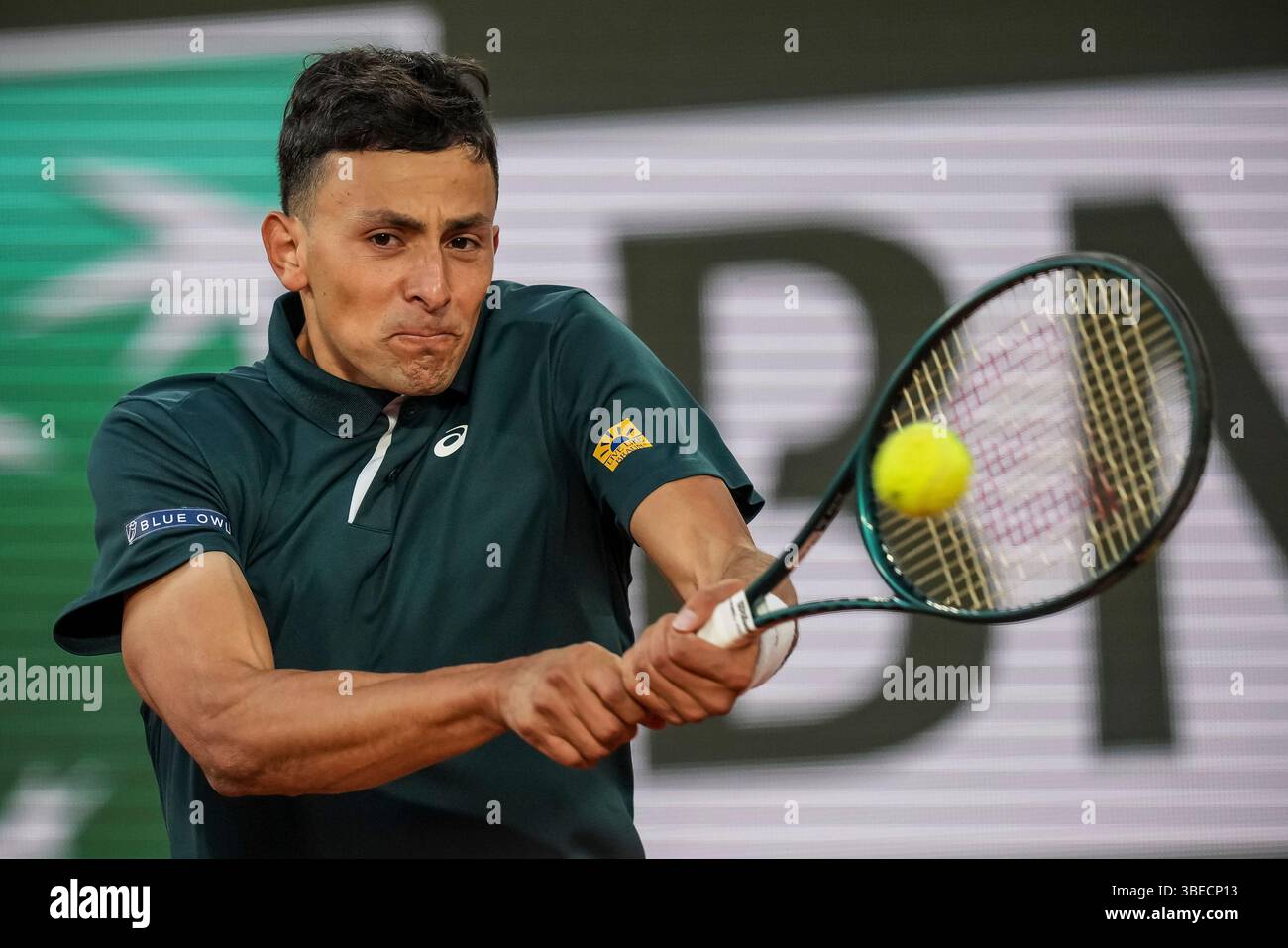 Emilio Nava of the United States returns the ball to Denmark's Holger ...