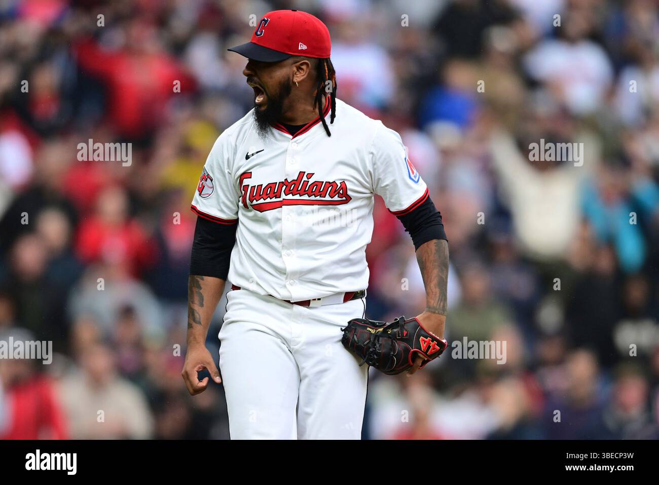 Cleveland Guardians relief pitcher Emmanuel Clase reacts after striking ...