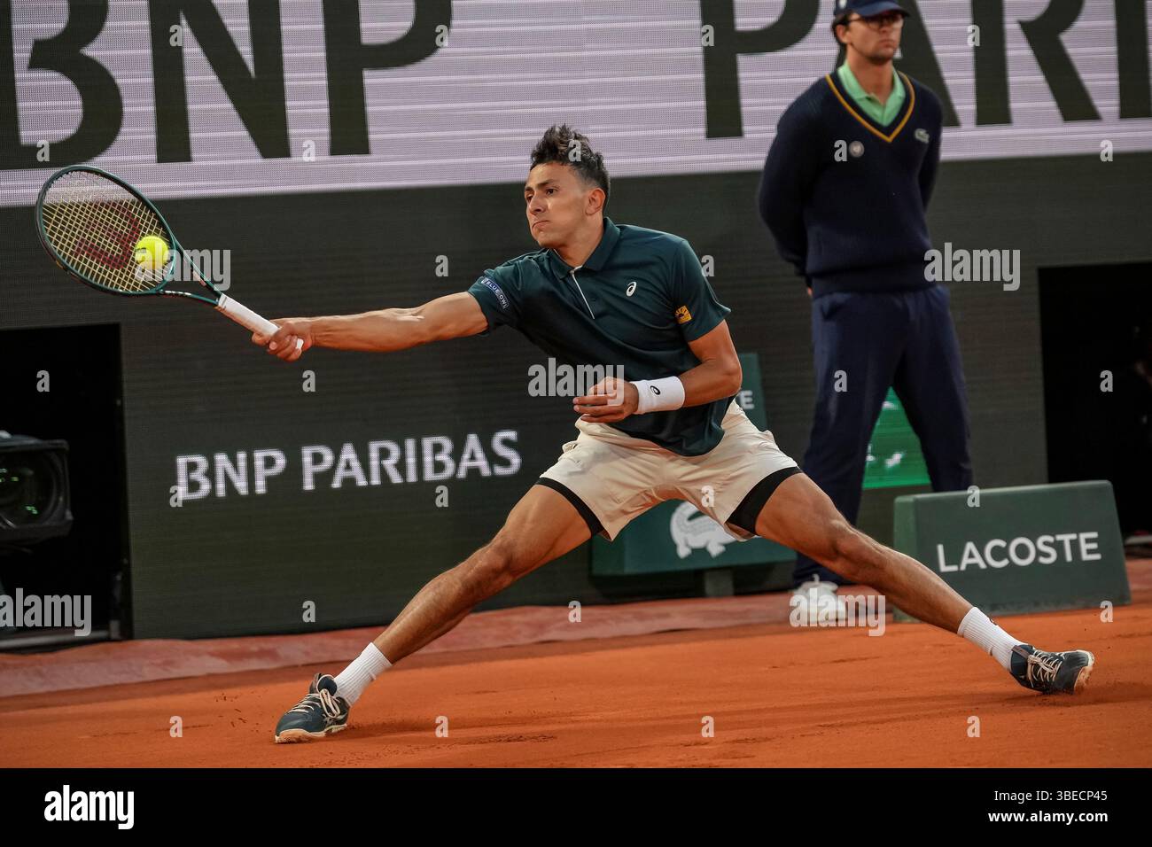 Emilio Nava of the United States returns the ball to Denmark's Holger ...