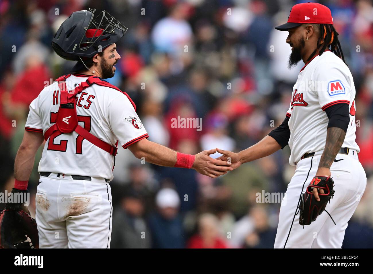 Cleveland Guardians relief pitcher Emmanuel Clase is congratulated by ...