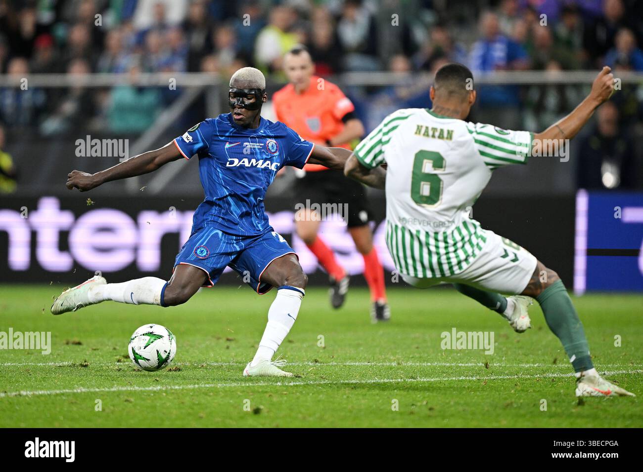 Chelsea's Moises Caicedo (left) scores their side's fourth goal of the ...