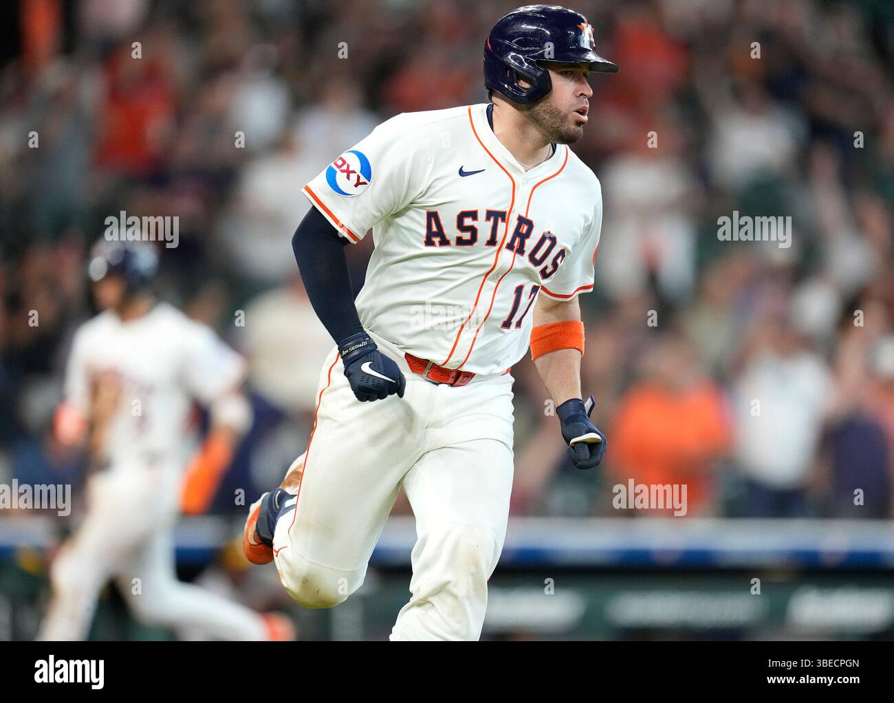 Houston Astros' Victor Caratini (17) hits a two-run single against ...