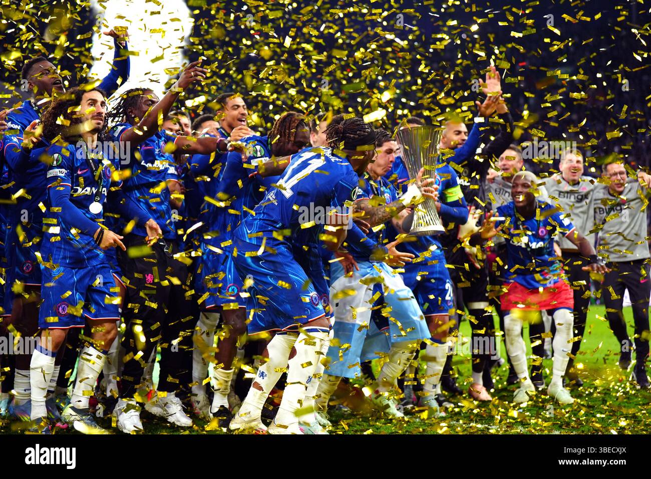 Chelsea players celebrate with the trophy following the UEFA Conference ...