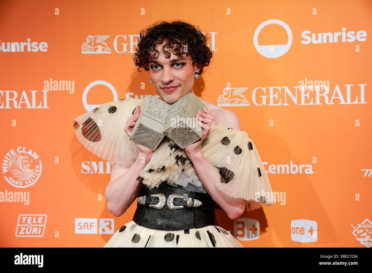 Zurich, Switzerland, May 28th 2025: Musician Nemo poses with two ...