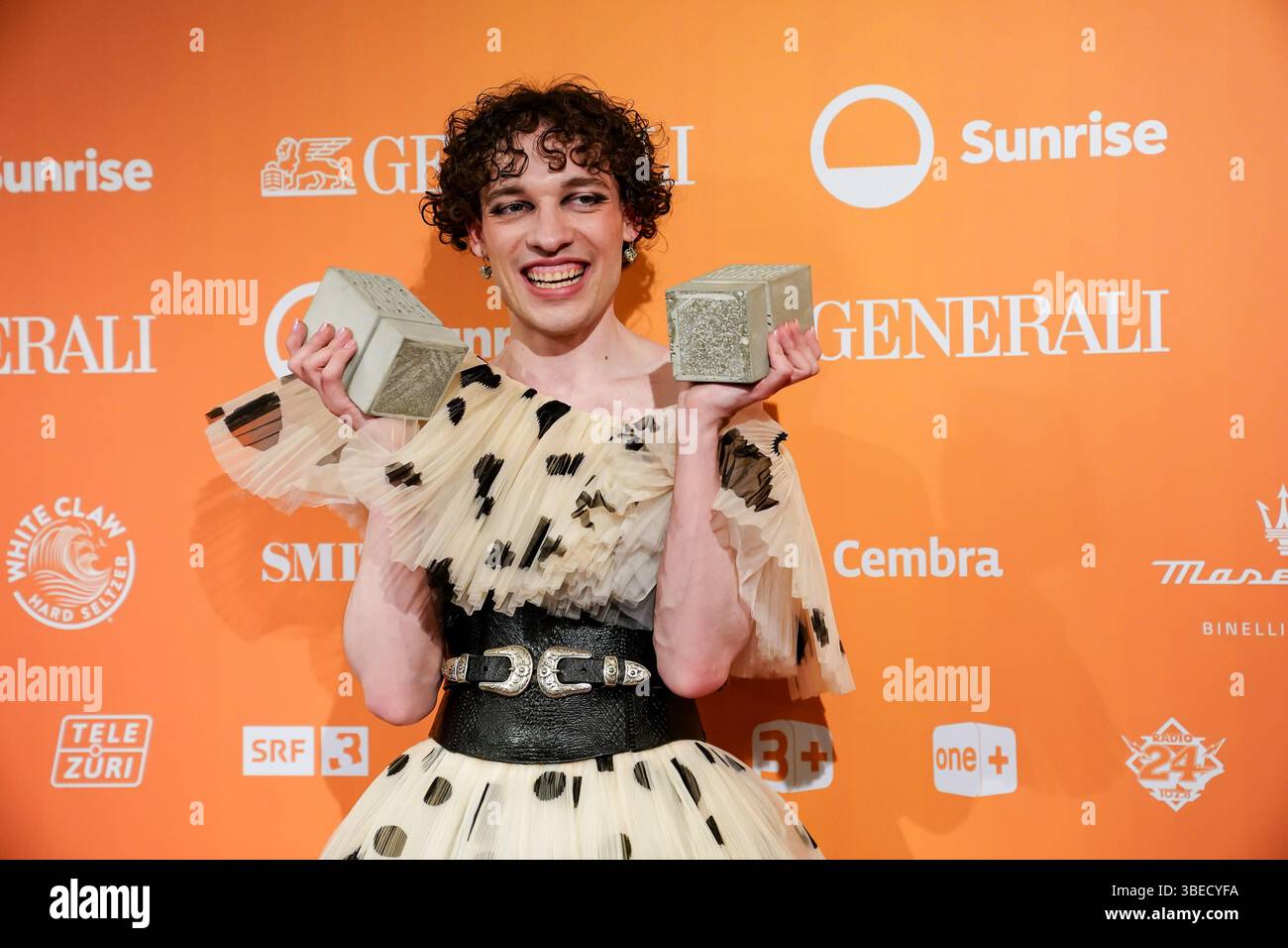 Zurich, Switzerland, May 28th 2025: Musician Nemo poses with two ...