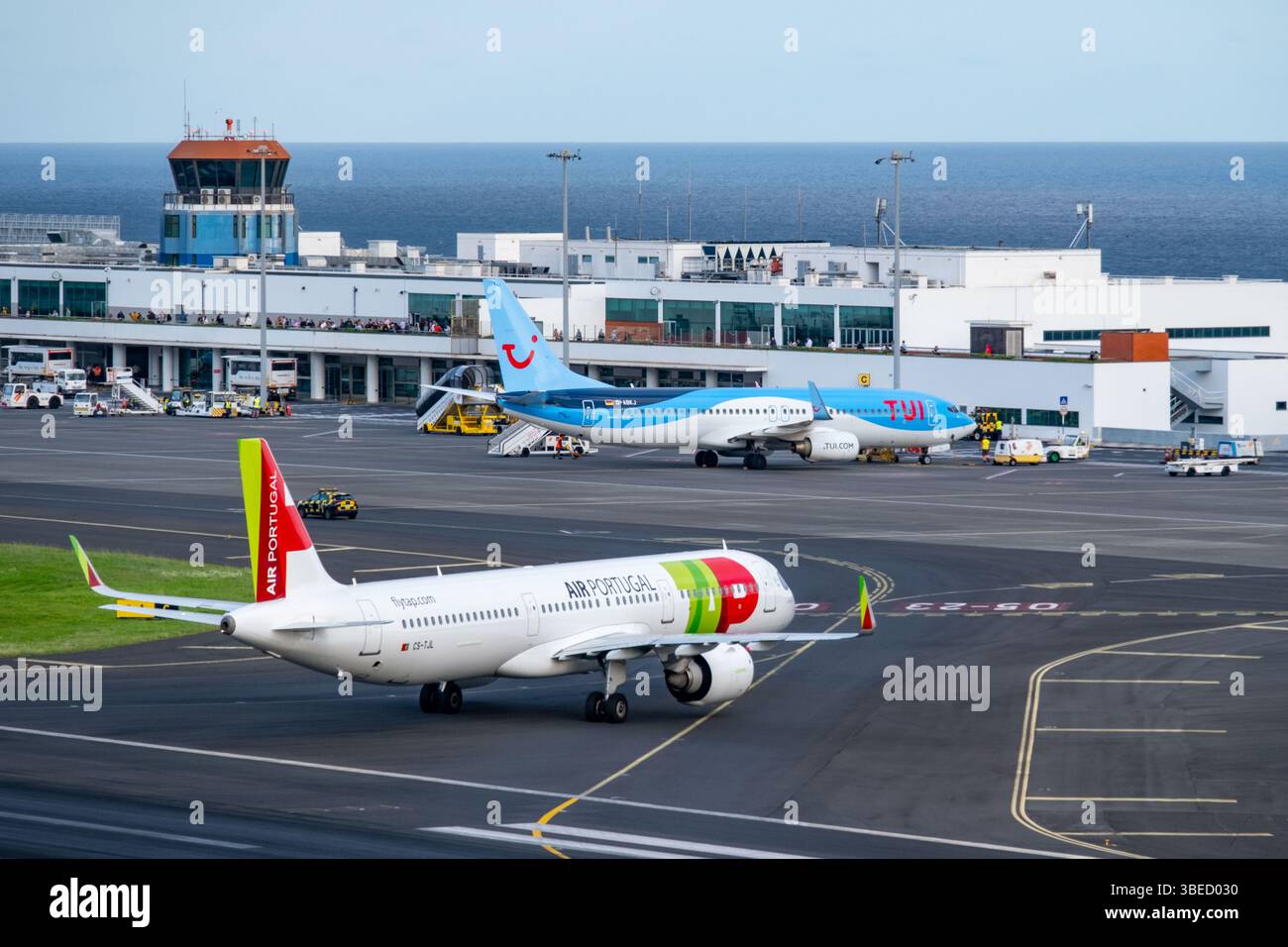 Multiple airplanes parked at Madeira International Madeira Funchal ...