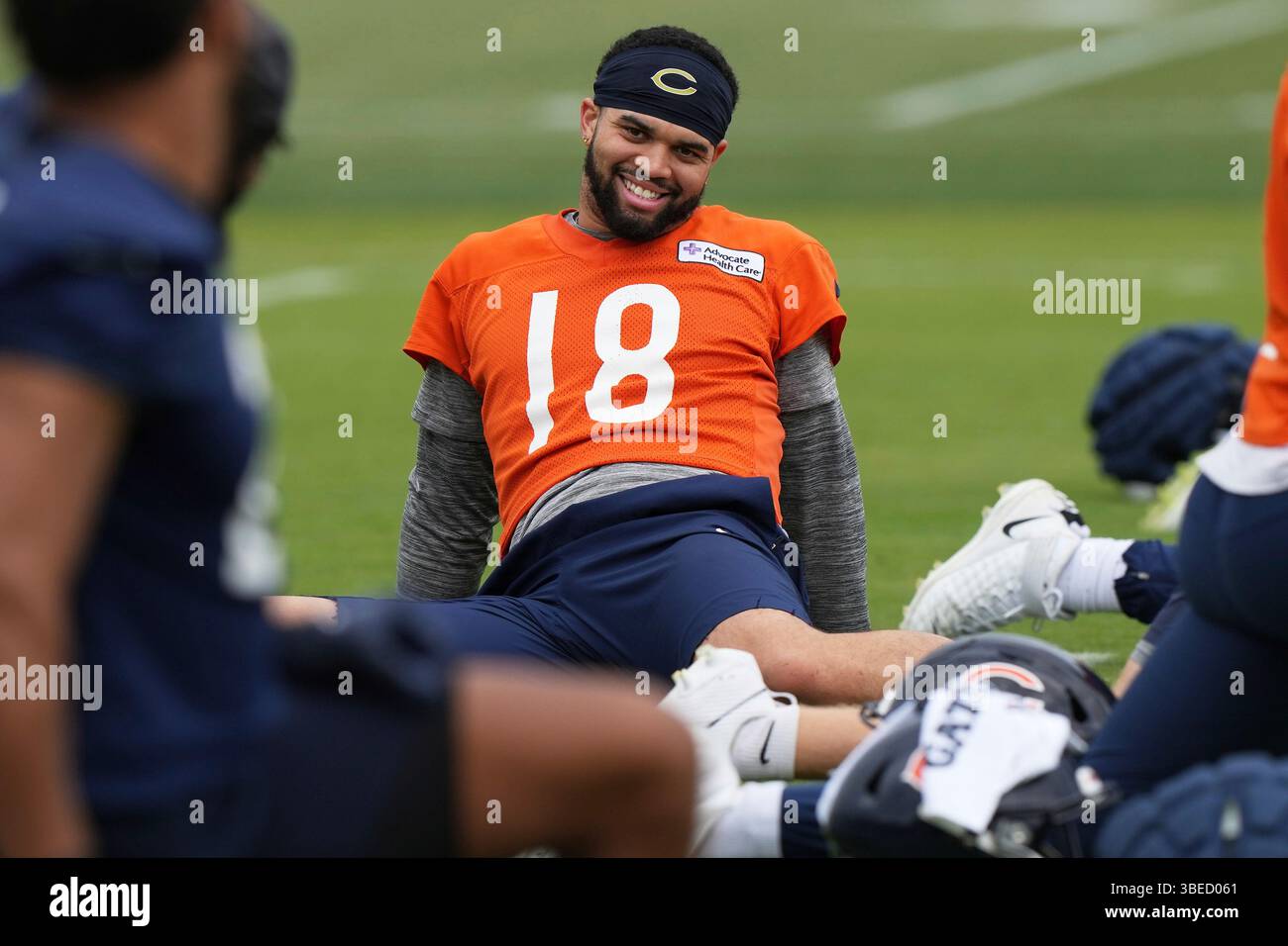 Chicago Bears quarterback Caleb Williams (18) smiles as he warms up ...