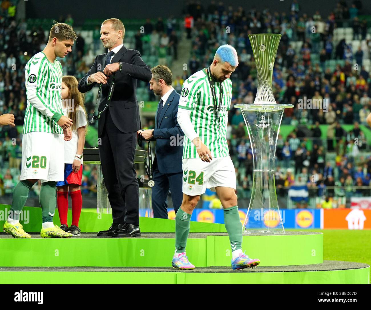 Real Betis' Aitor Ruibal walks past the trophy following the UEFA ...