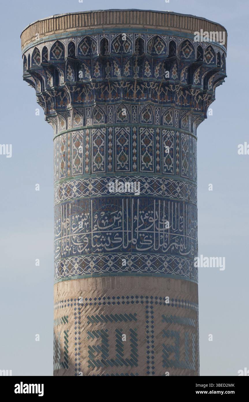 Closeup of the top of the tower with a mosaic of quite ancient Asian ...