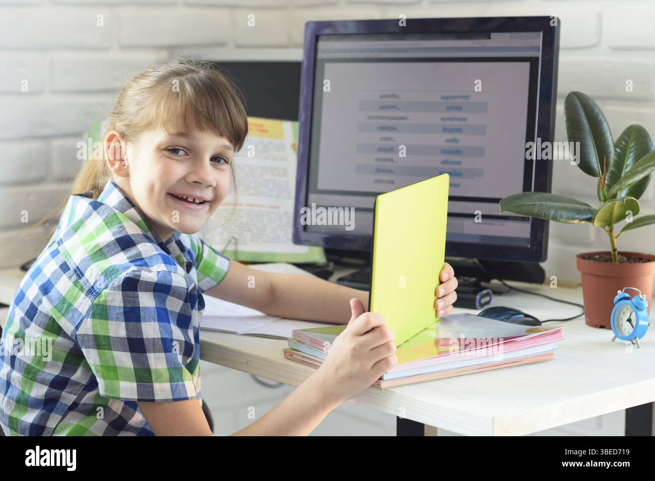 Child girl distance education homework hi-res stock photography and ...