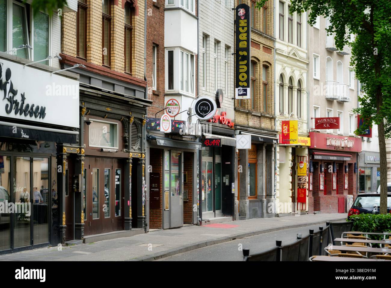 Cologne, Germany May 26 2025: Bars, restaurants and stores on ...