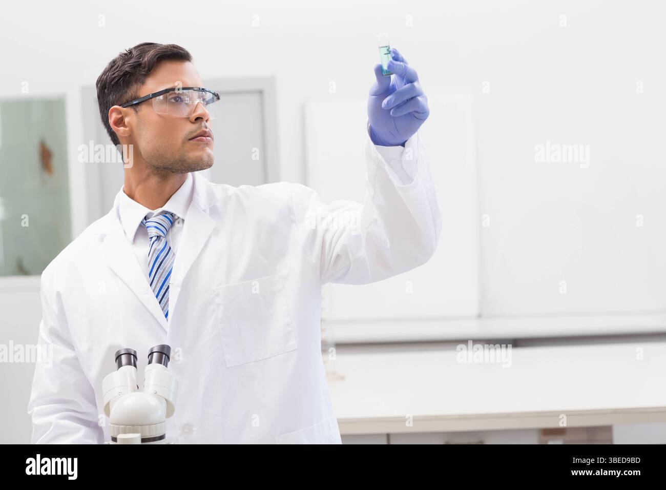 Adult male scientist wearing green hi-res stock photography and images ...