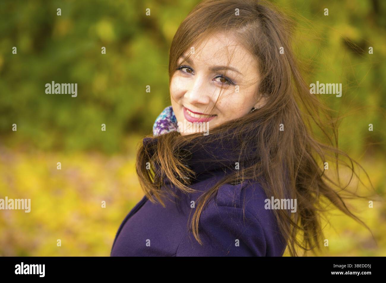 Portrait of a smiling beautiful girl with disheveled hair Stock Photo ...