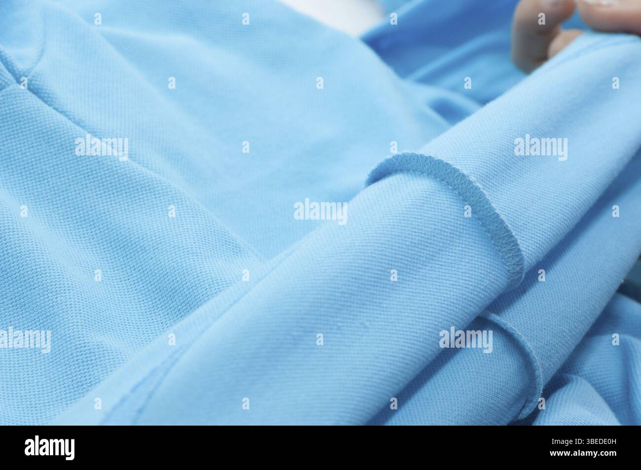 At a garment factory quality control check for defects Stock Photo - Alamy