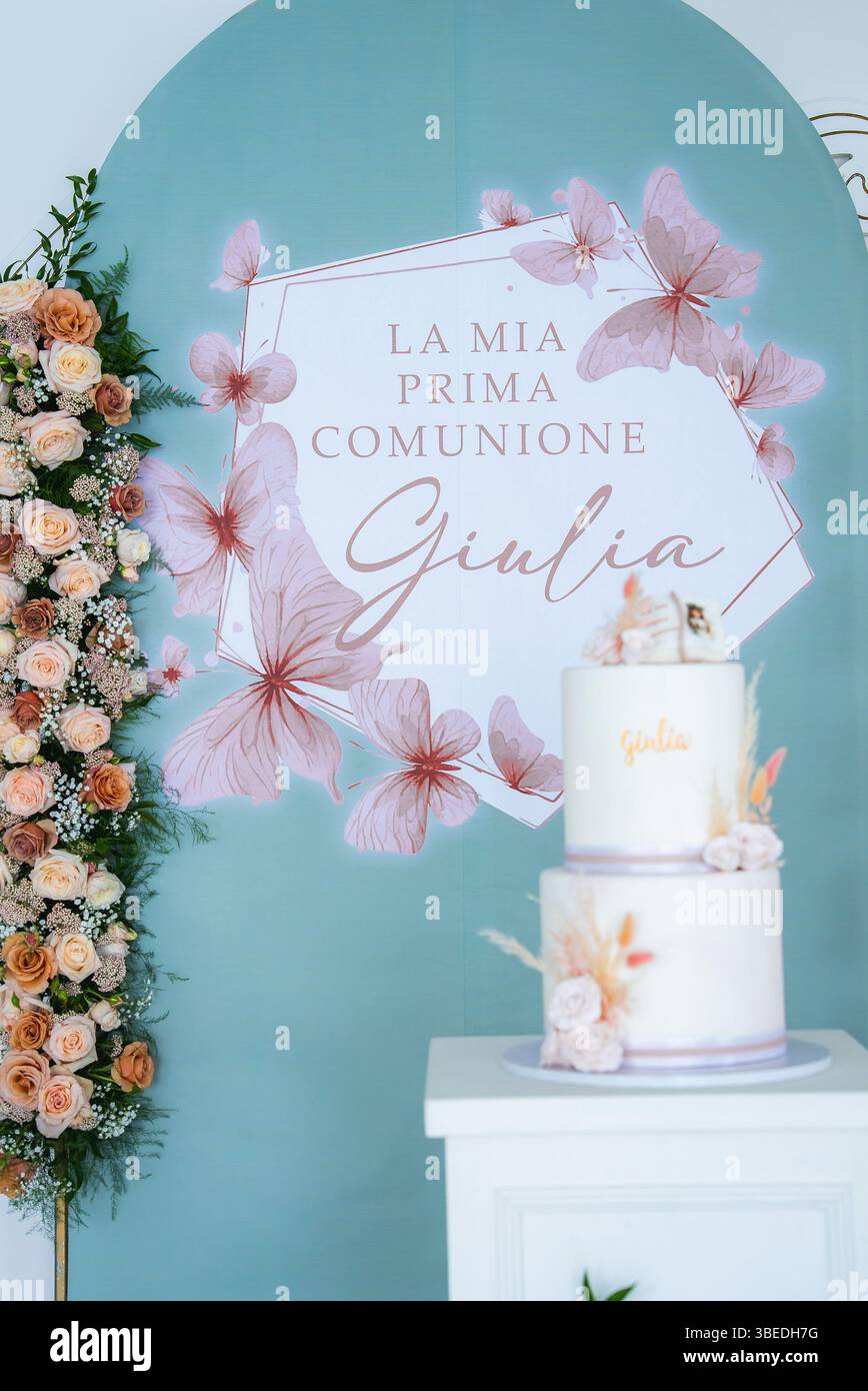 First Communion Celebration Setup with Pastel Green Backdrop Stock ...