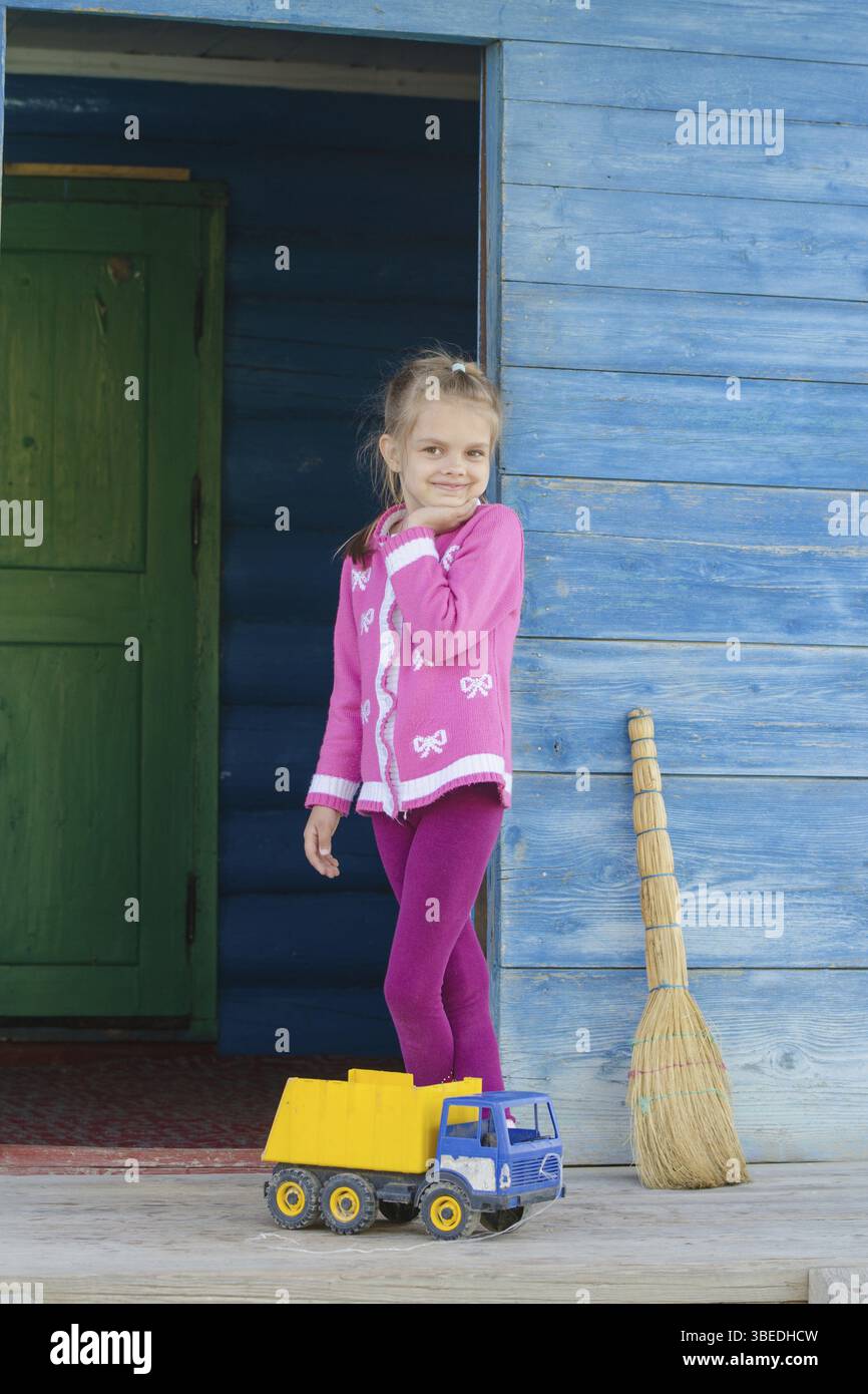 Girl playing dump truck hi-res stock photography and images - Alamy