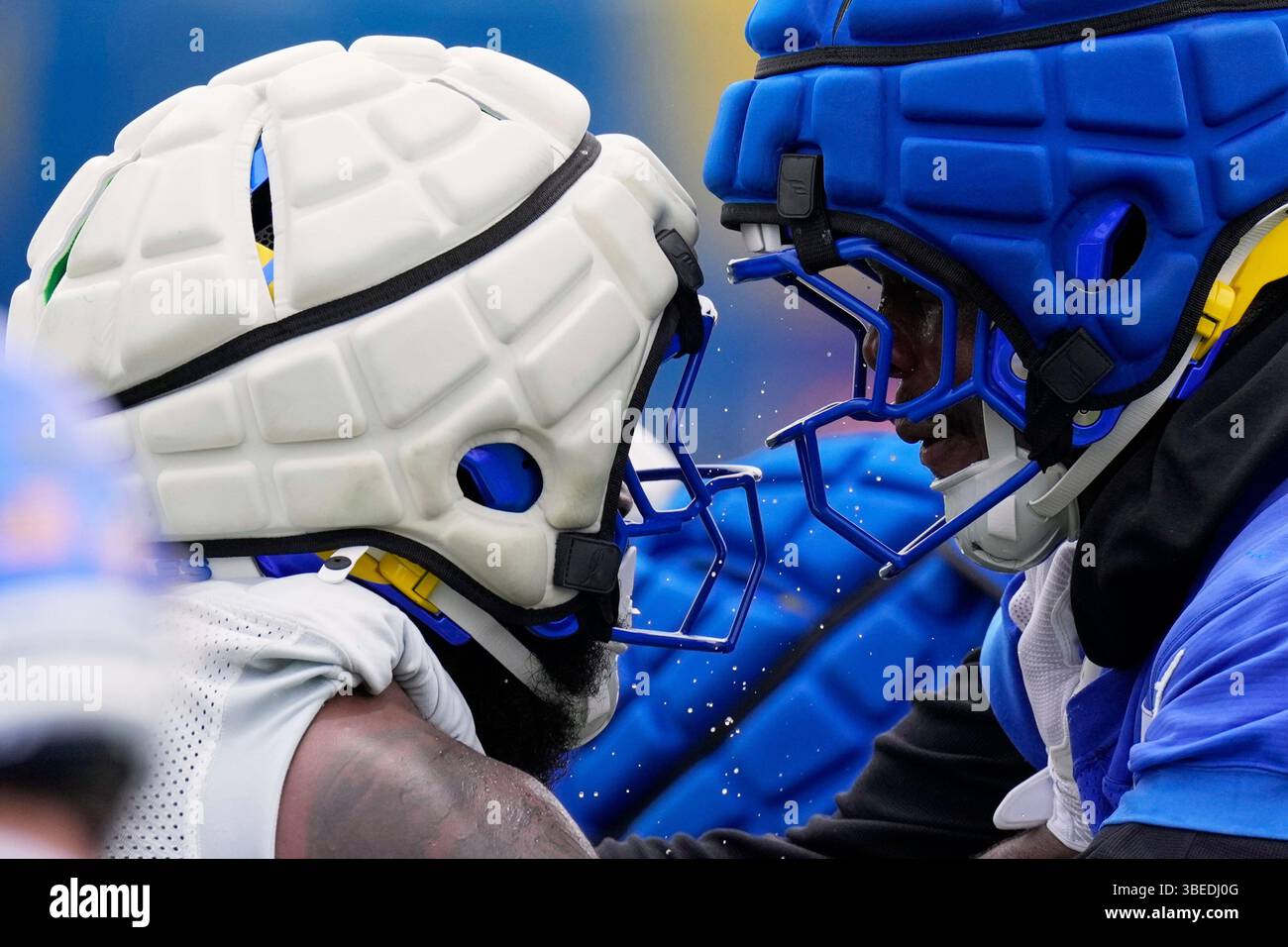 Los Angeles Rams linebacker Jared Verse, left, and offensive tackle ...