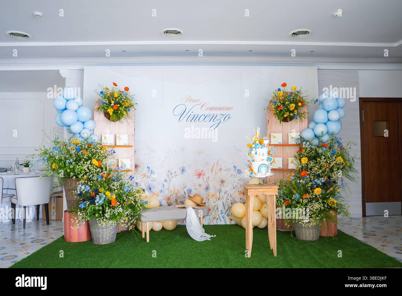 Indoor Event Setup with Floral Backdrop and Festive Decorations Stock ...