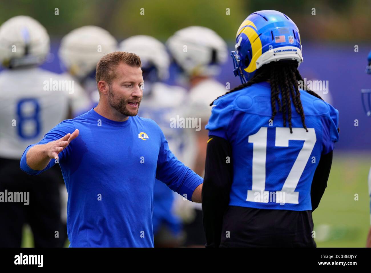 Los Angeles Rams head coach Sean McVay talks with wide receiver Davante ...