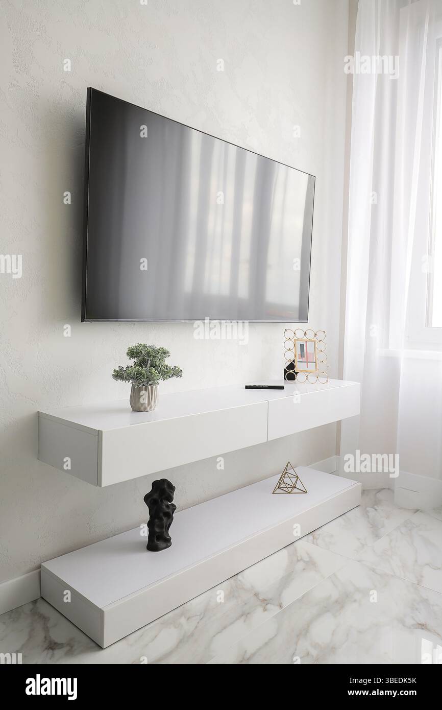 Modern large TV in the living room Stock Photo - Alamy