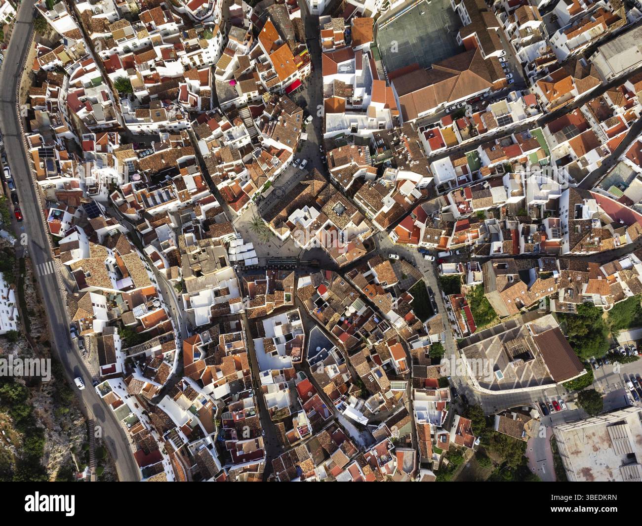 Overhead view of the curved streets and rooftops in Ojen, revealing the ...