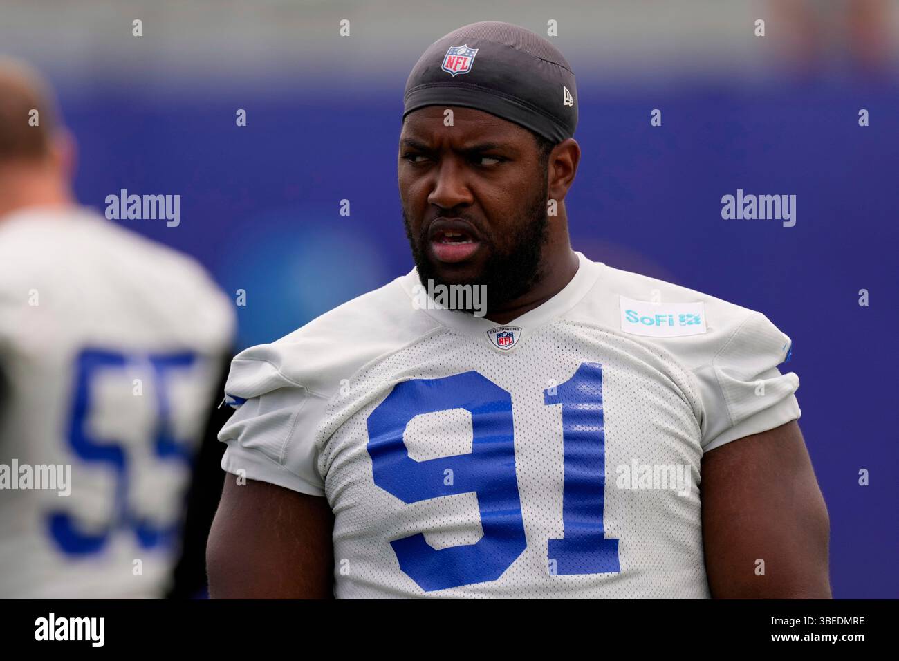 Los Angeles Rams defensive tackle Kobie Turner stands on the field ...