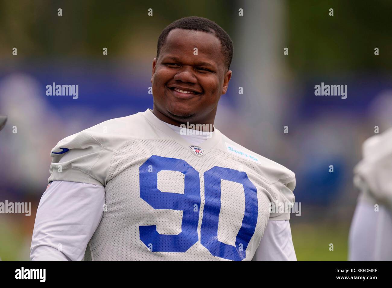 Los Angeles Rams defensive tackle Tyler Davis stands on the field ...