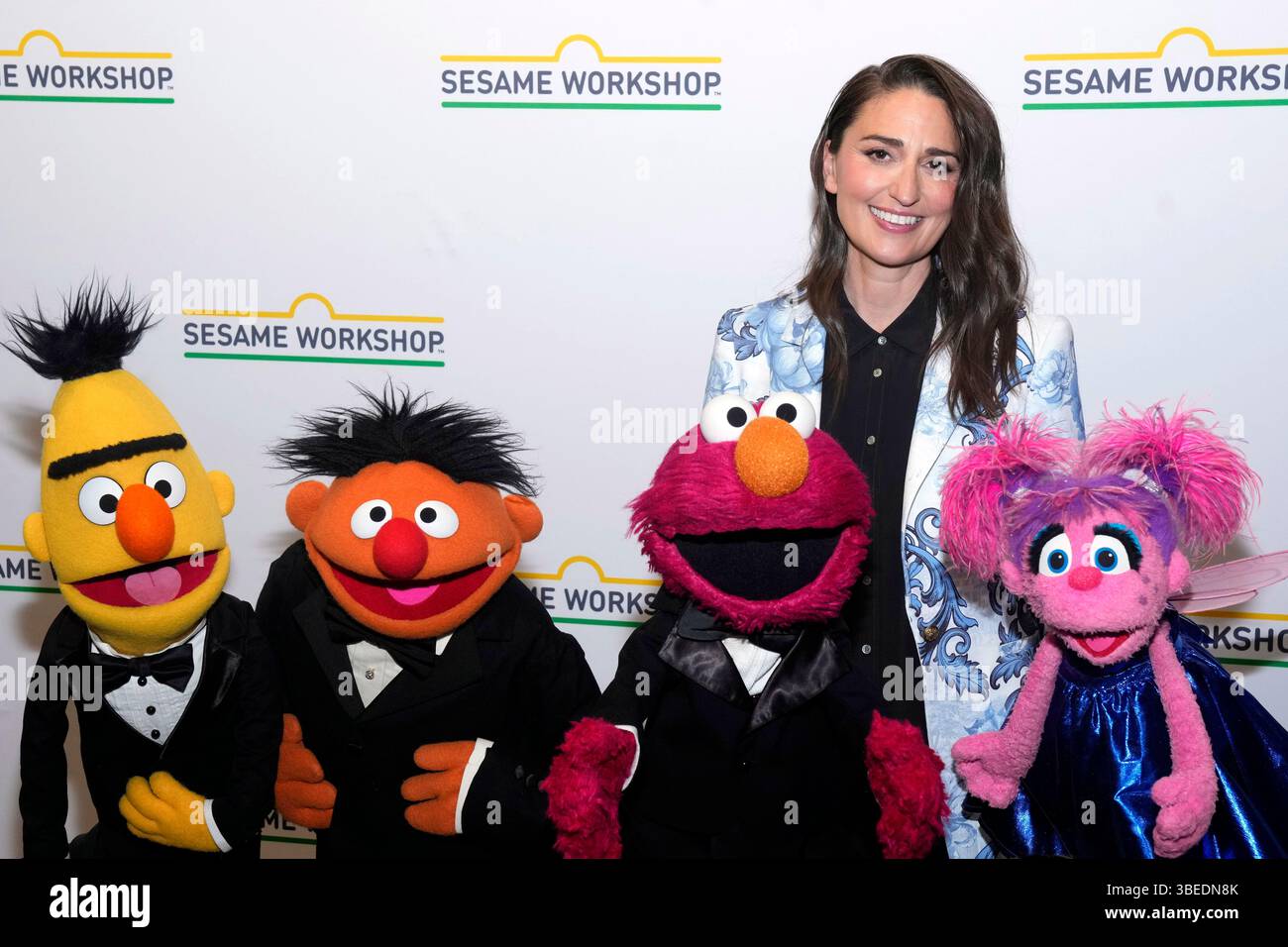 Sara Bareilles poses with Sesame Street Muppets at the Sesame Workshop ...
