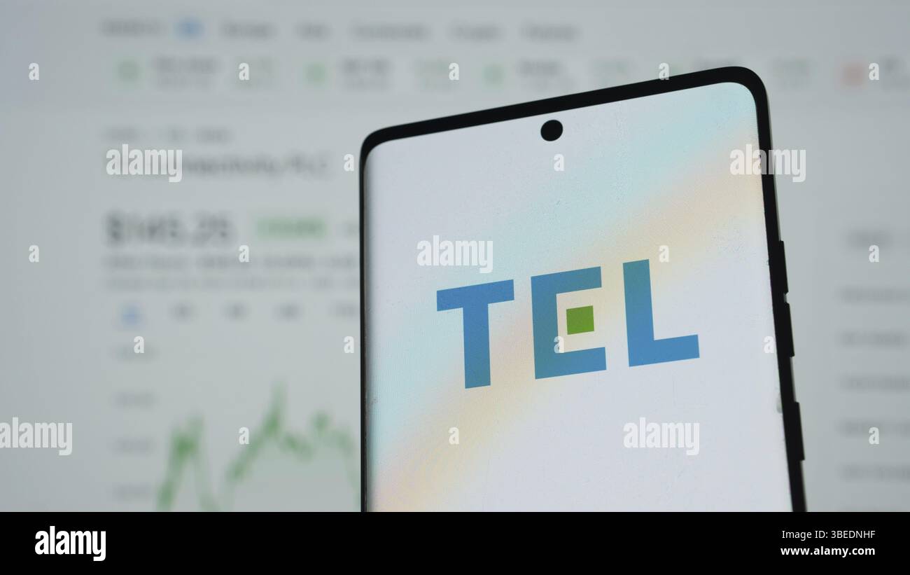 Tokyo Electron (TEL) logo displayed on a smartphone with a blurred ...