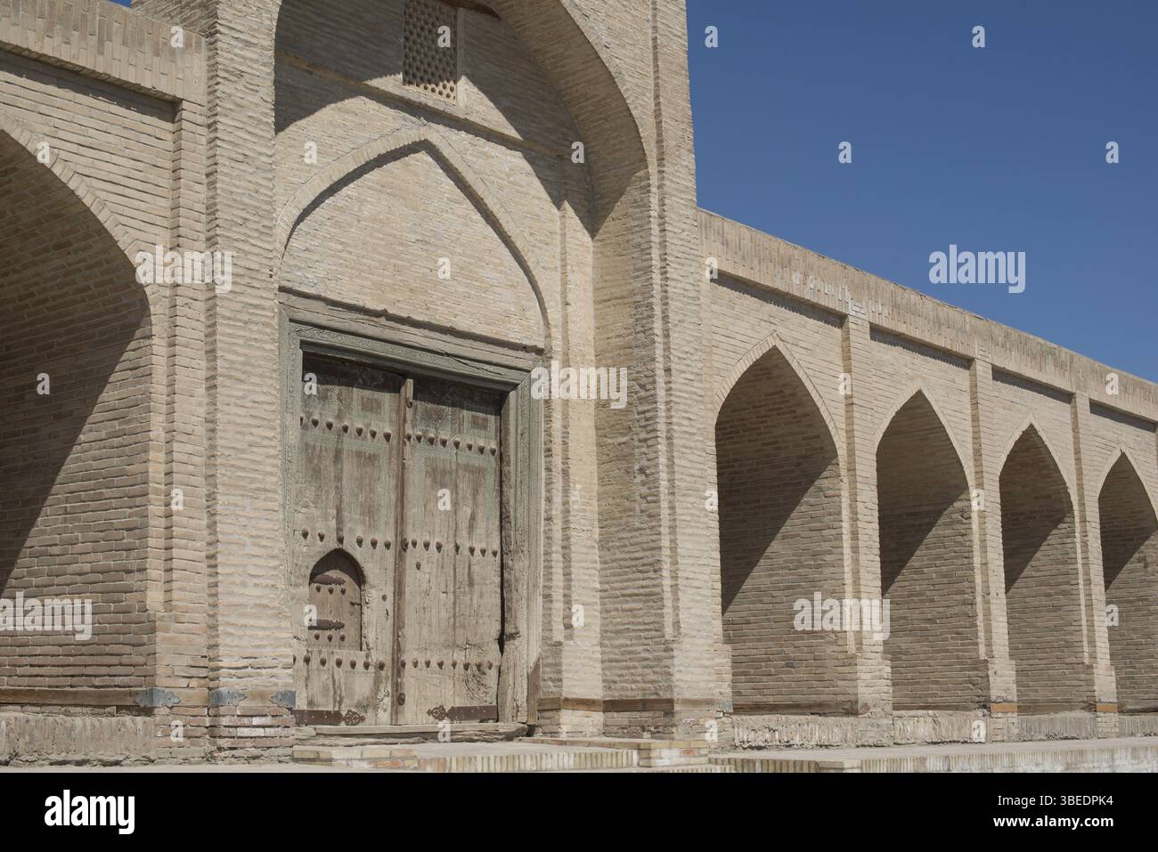 The old building, the wall with arches. Ancient buildings of medieval ...